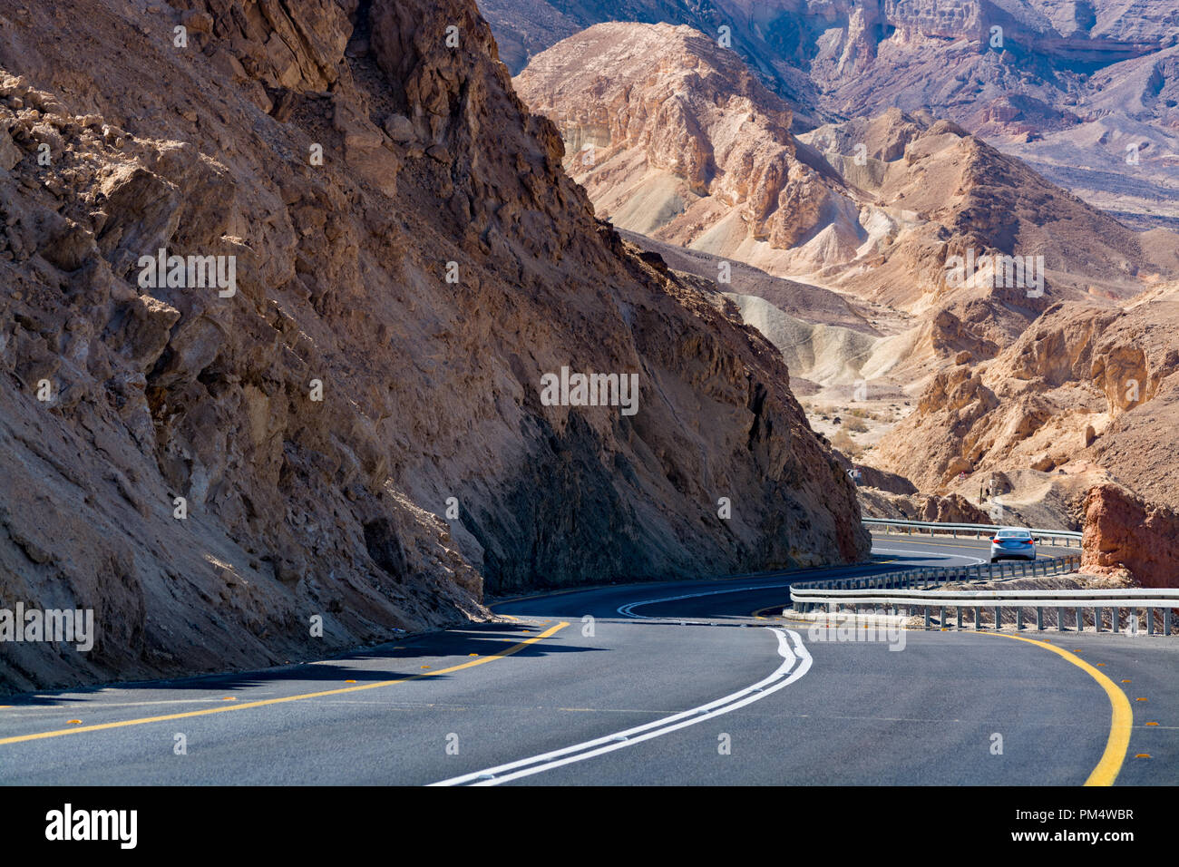 Asphalt road in desert Negev, Israel, road 40, transport infrastructure ...
