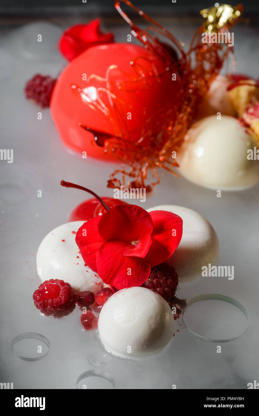 Yogurt spheres and berries Stock Photo - Alamy