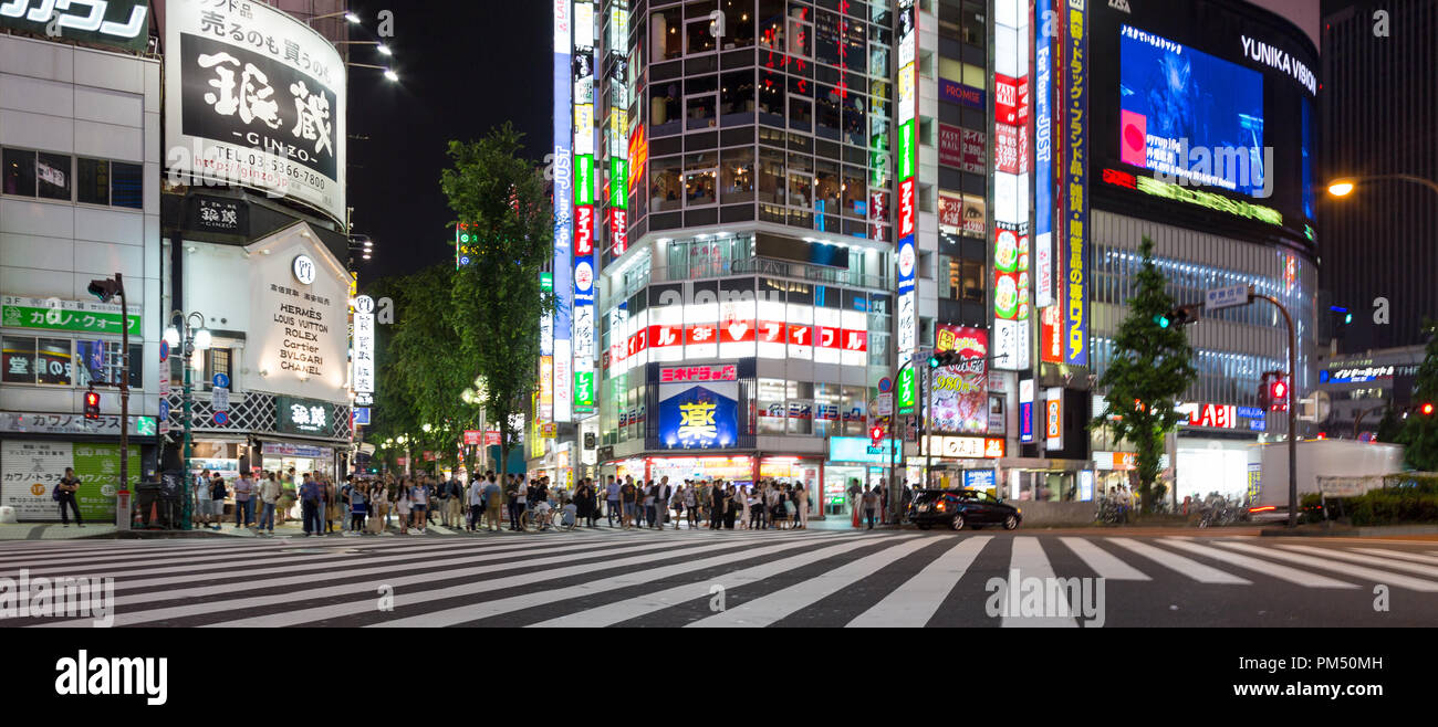 Tokyo, Japan - 19th June 2016: People waiting to cross the street in ...