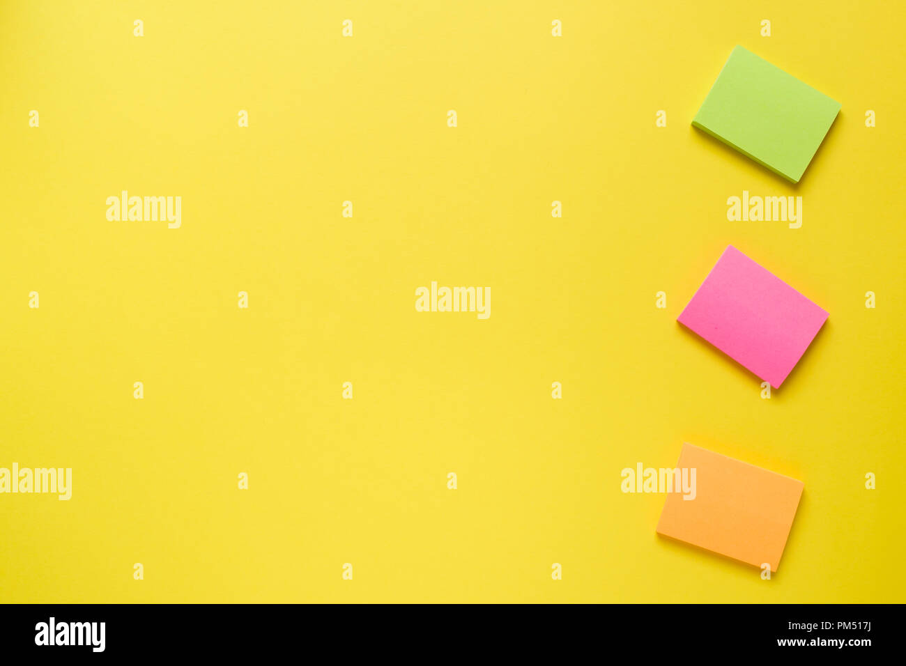 Office supplies on yellow table with copy space. Education concept ...