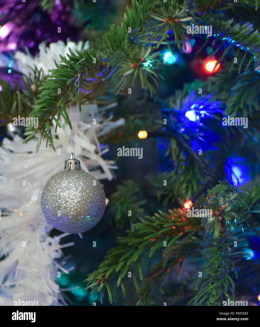 Christmas Decorations hanging from a tree Stock Photo - Alamy