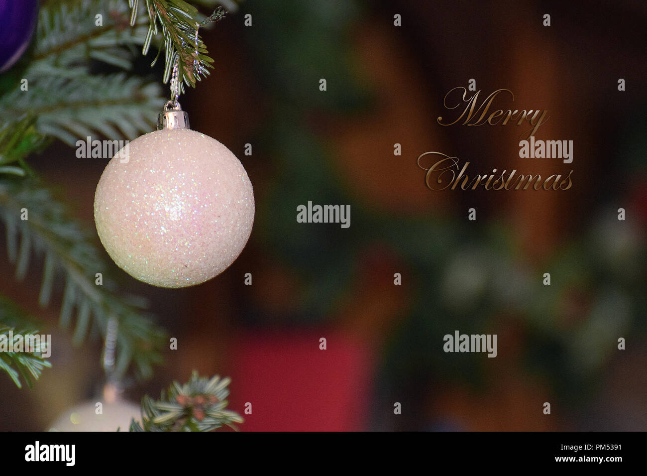 White Bauble with Xmas Message Stock Photo - Alamy