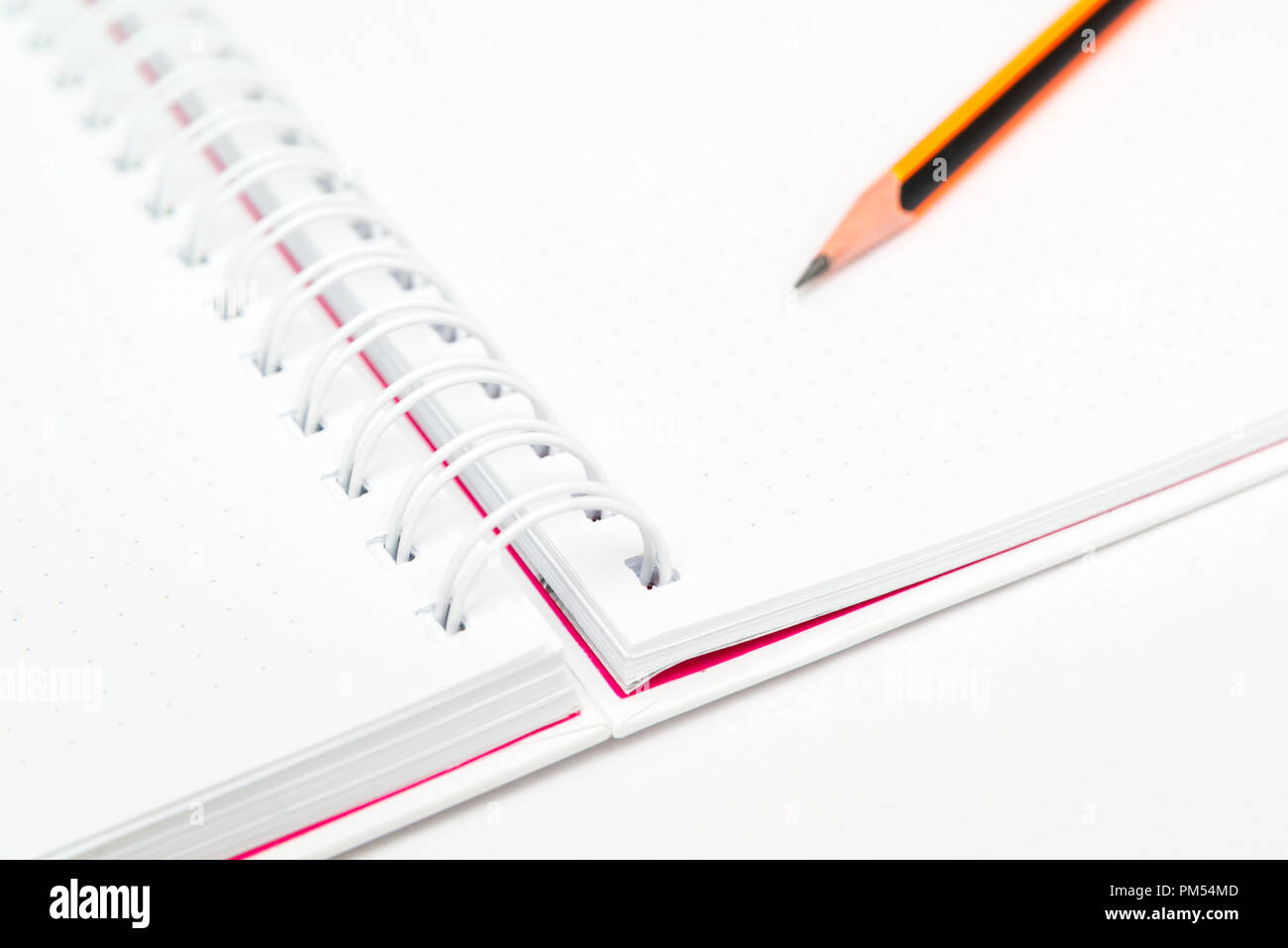 white background, notepad for notes, blank on rings, simple pencil ...