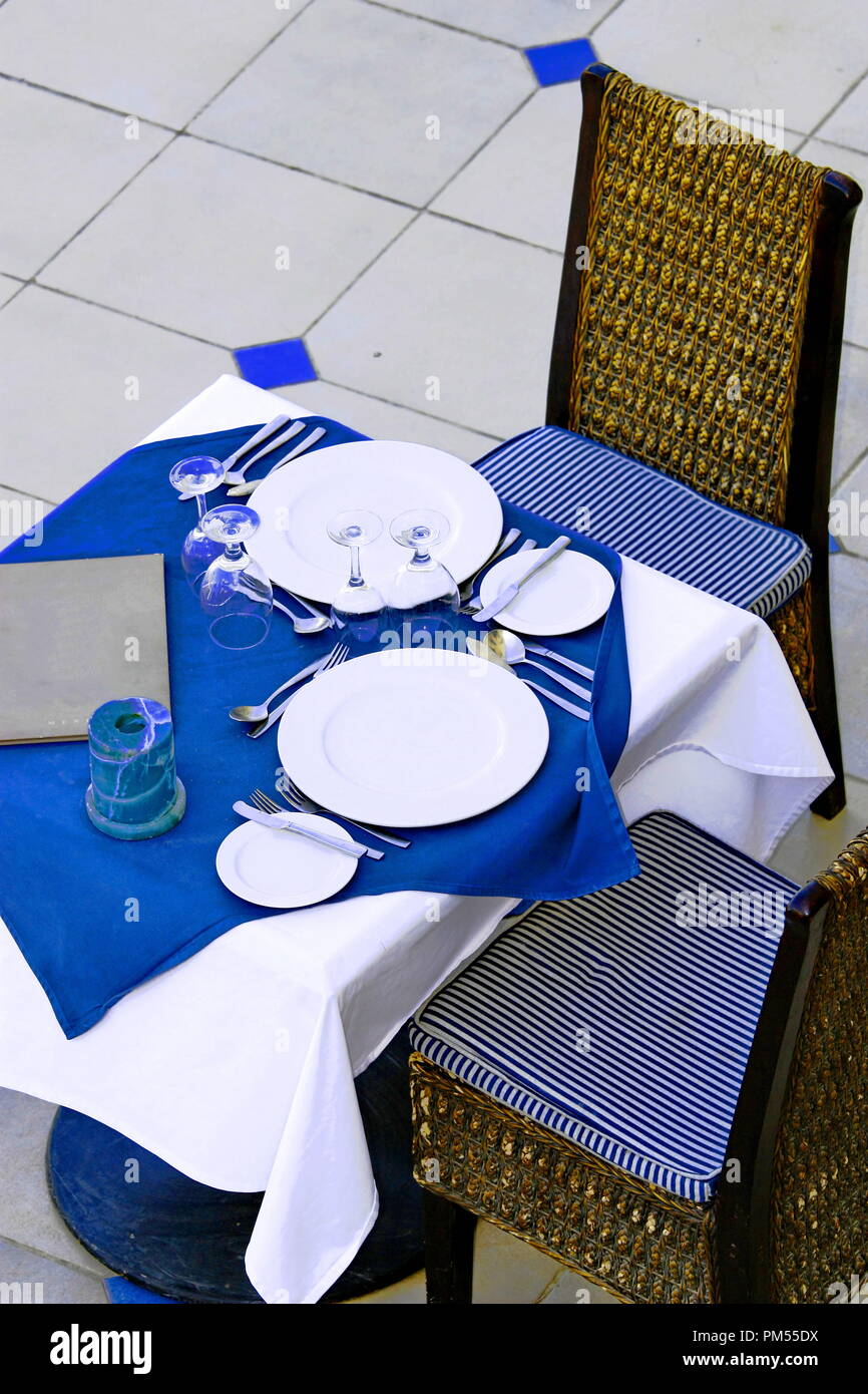 Restaurant dining table. Part a restaurant table, ready to invite ...