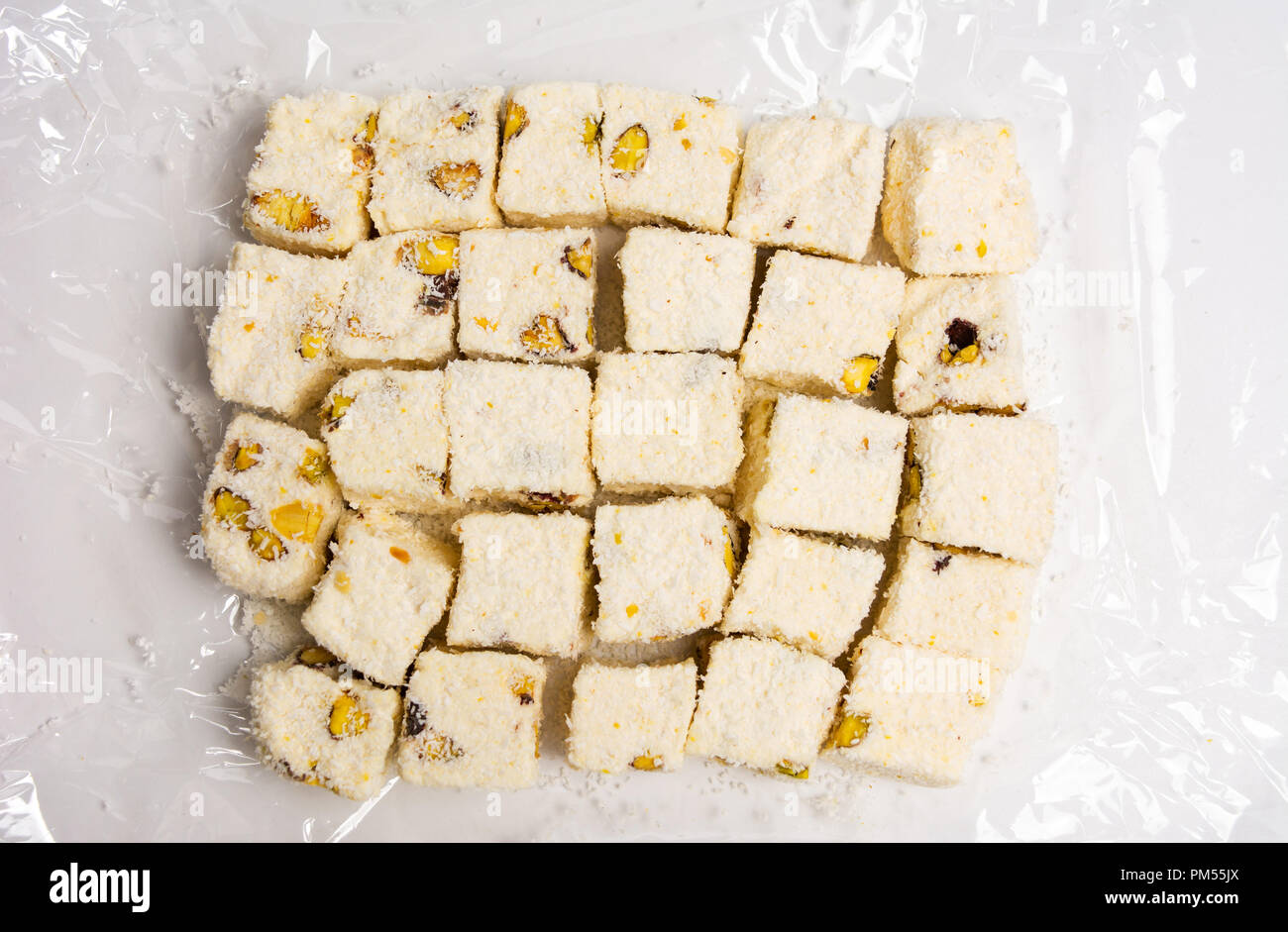 Turkish delight dessert with pistachio on white background Stock Photo ...
