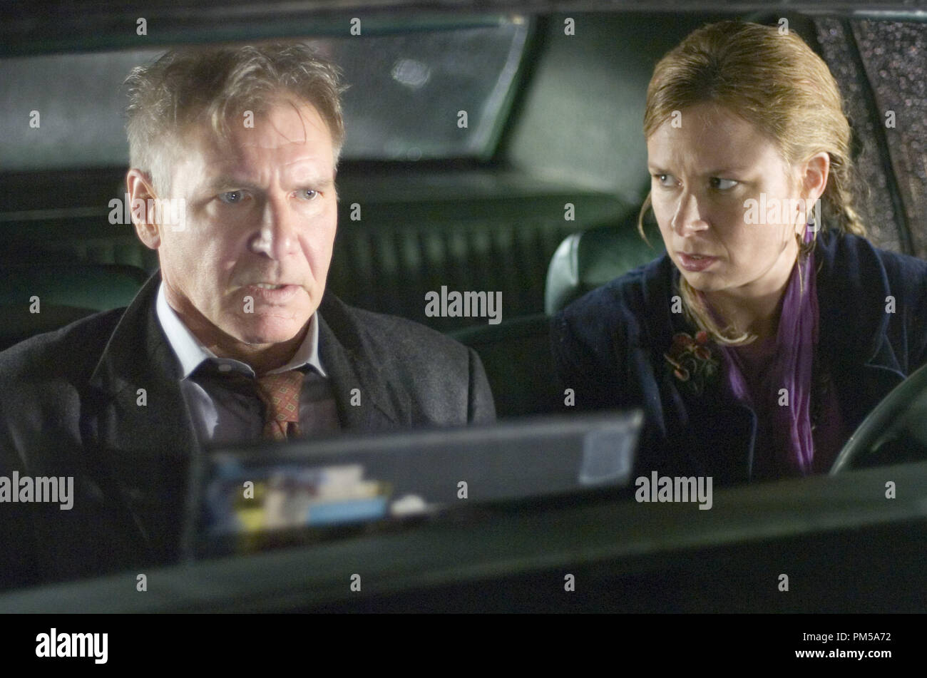Studio Publicity Still from "Firewall" Harrison Ford, Mary Lynn Rajskub ...