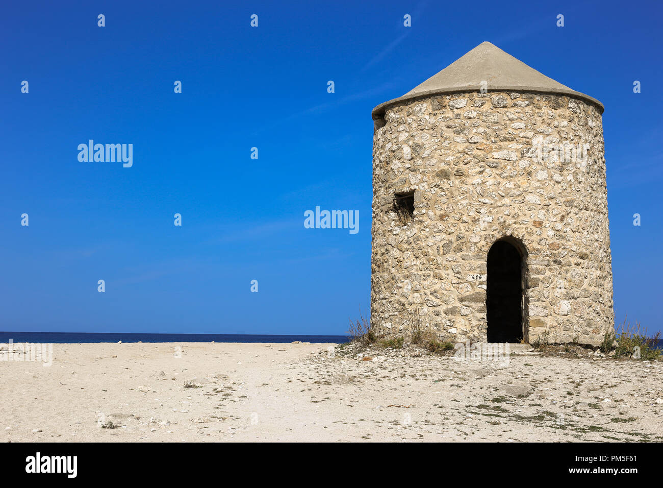 Old windmill in Gyra beach, Lefkada island, Greece Stock Photo - Alamy