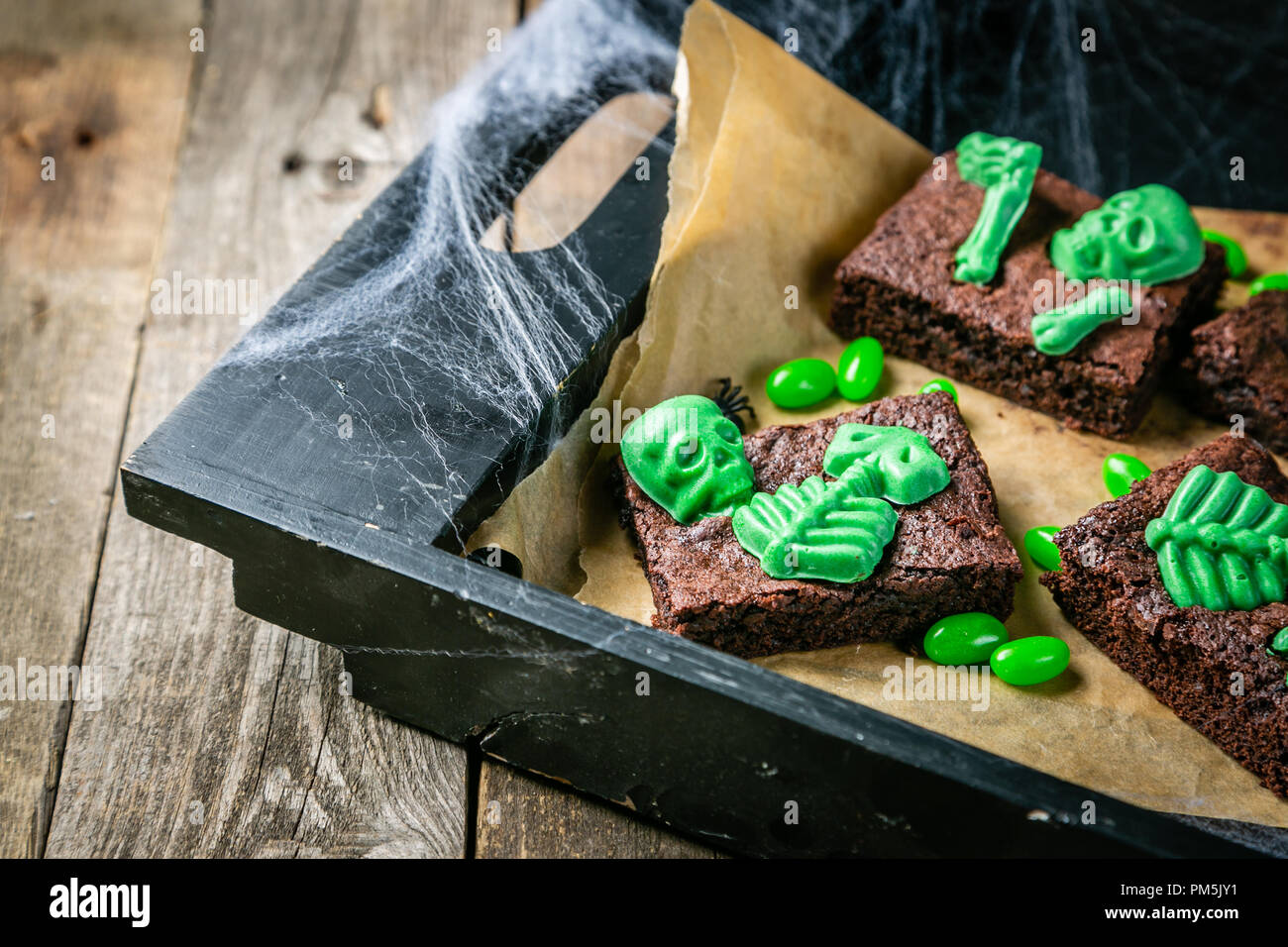 Halloween style party sweet - brownie with green skeleton and bones ...