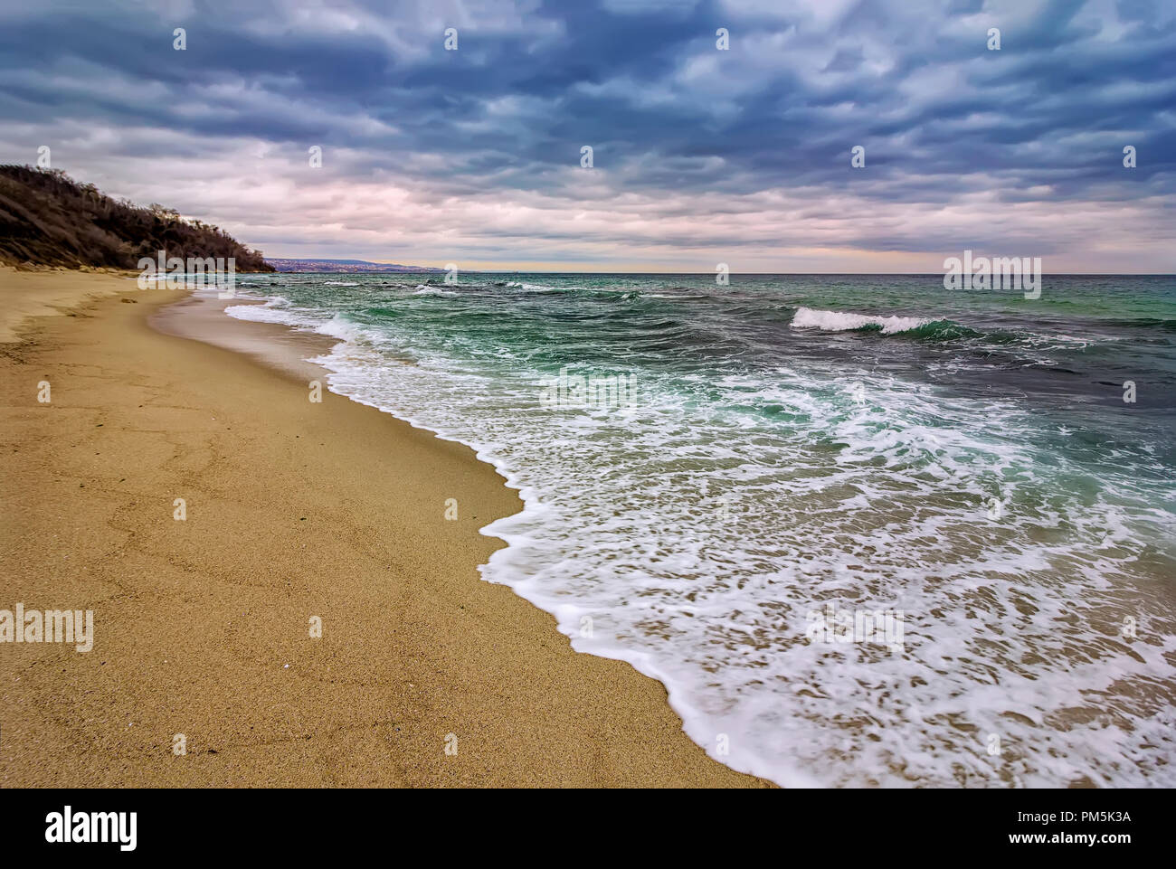 Cloudy mood over a beach hi-res stock photography and images - Alamy