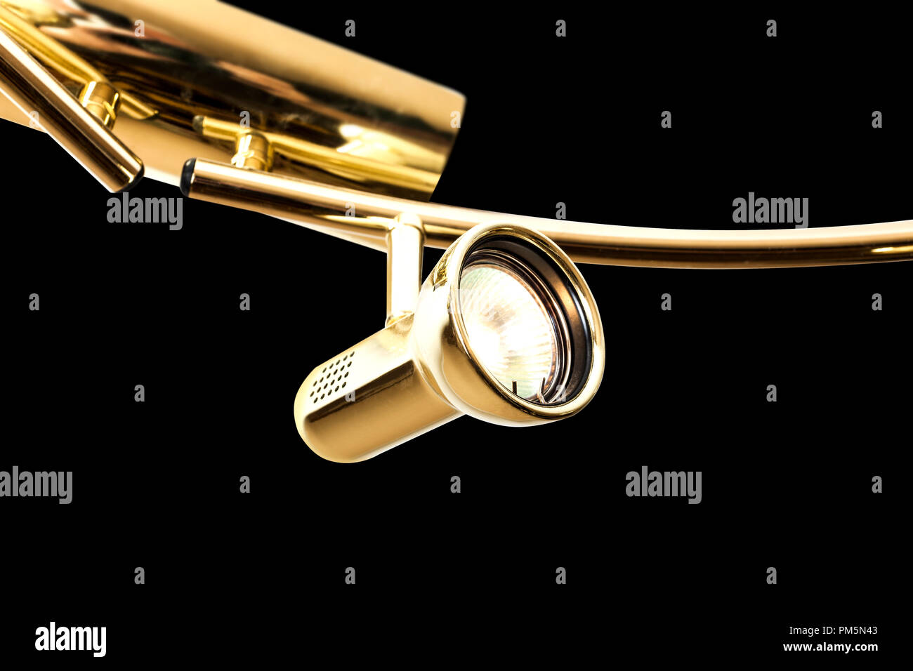 LED downlight, golden color isolated on black background Stock Photo ...