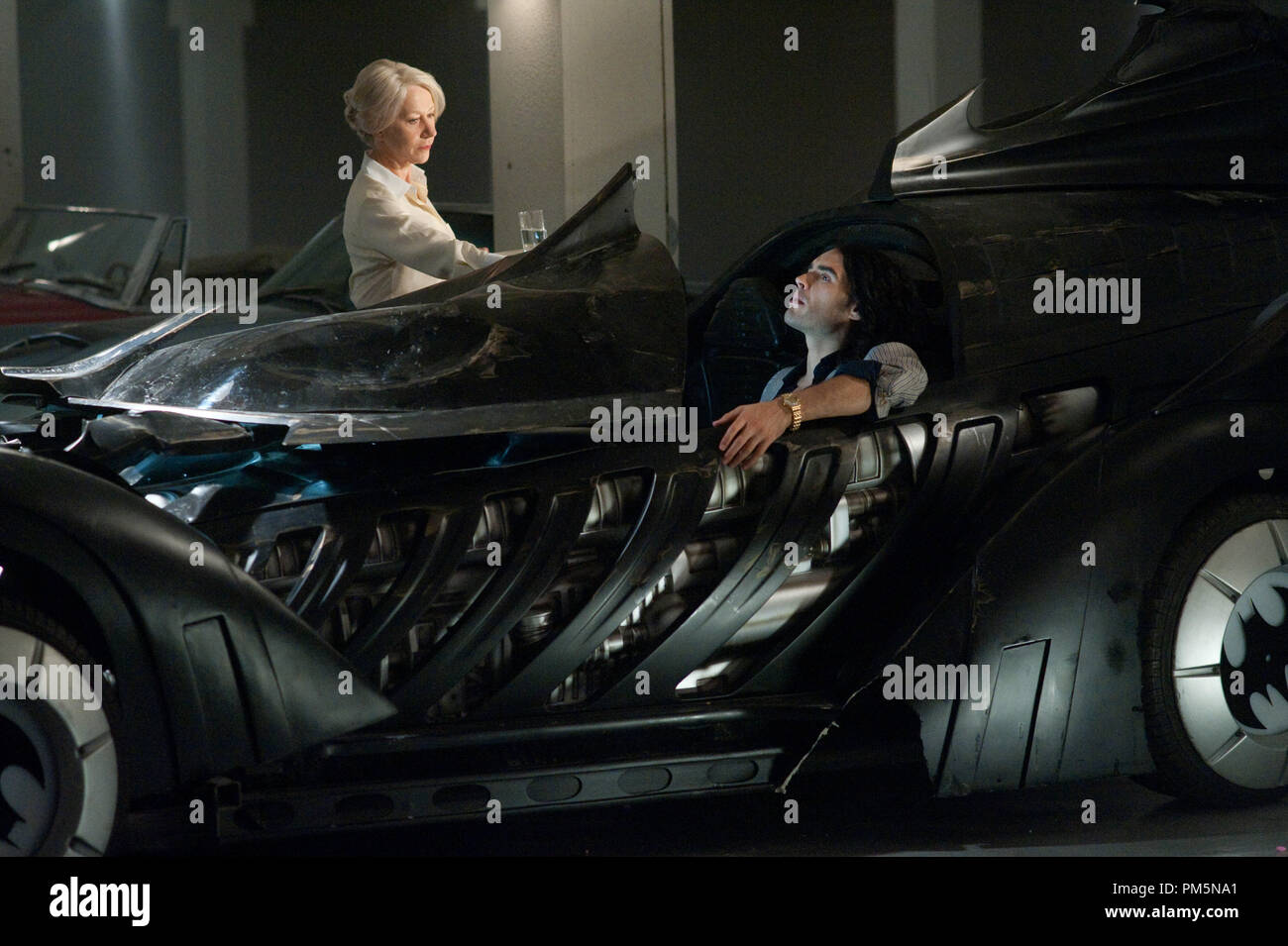 (L-r) HELEN MIRREN as Hobson and RUSSELL BRAND as Arthur in Warner Bros ...