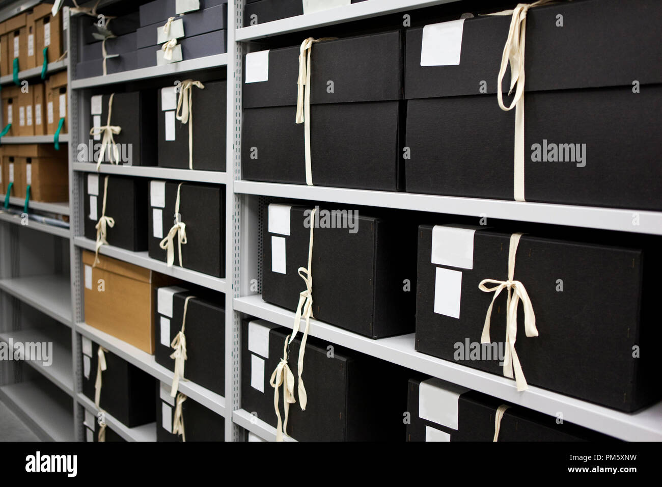 Archives and storage in a closet Stock Photo - Alamy