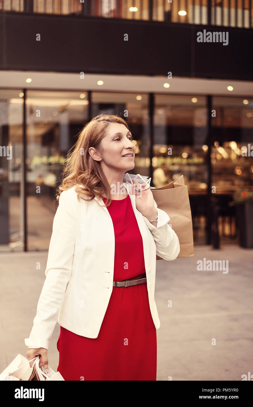 Happy girls out shopping at the mall hi-res stock photography and ...