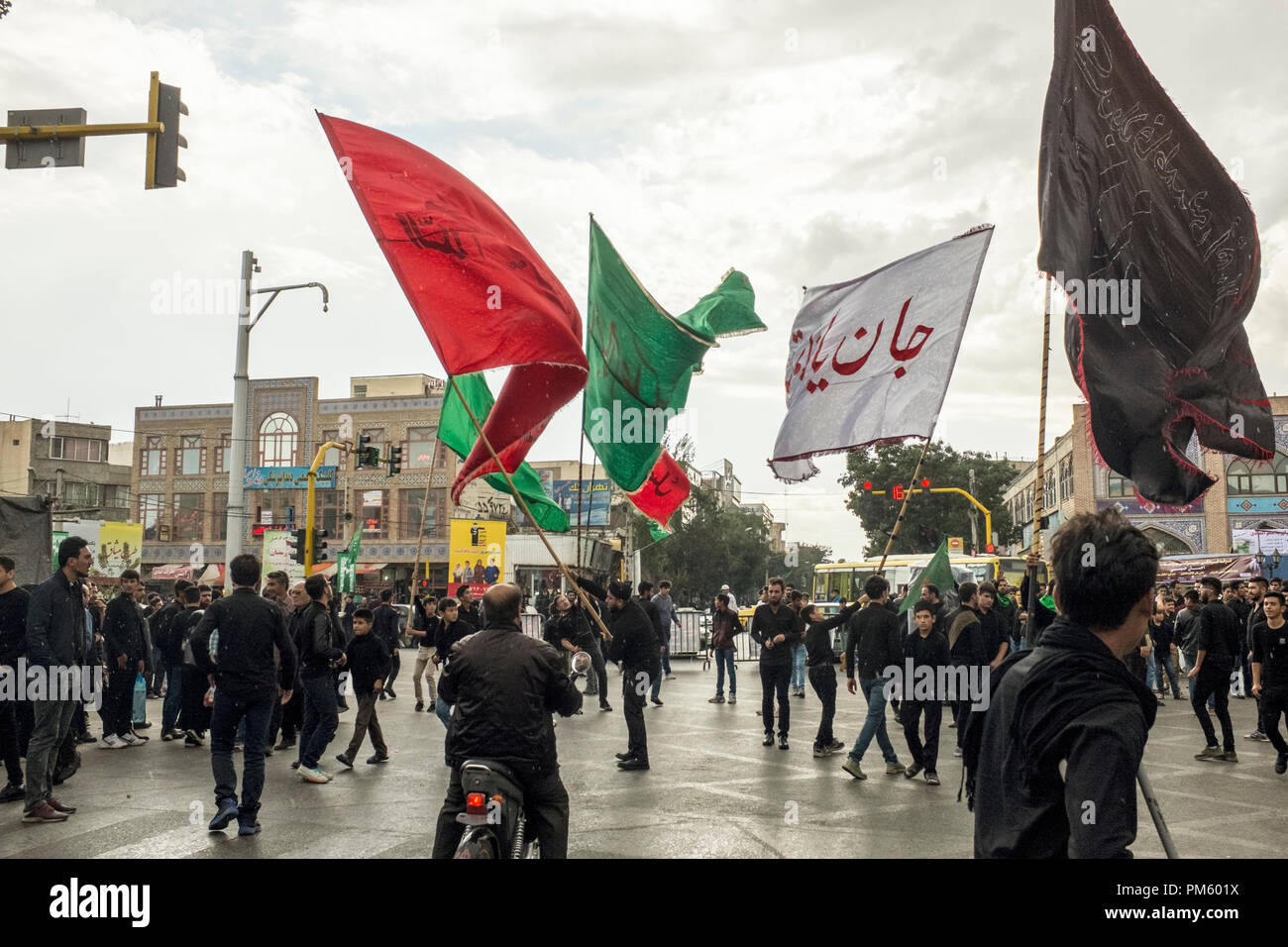 Young men waving Ashura flags in Ardabil, Iran Stock Photo - Alamy