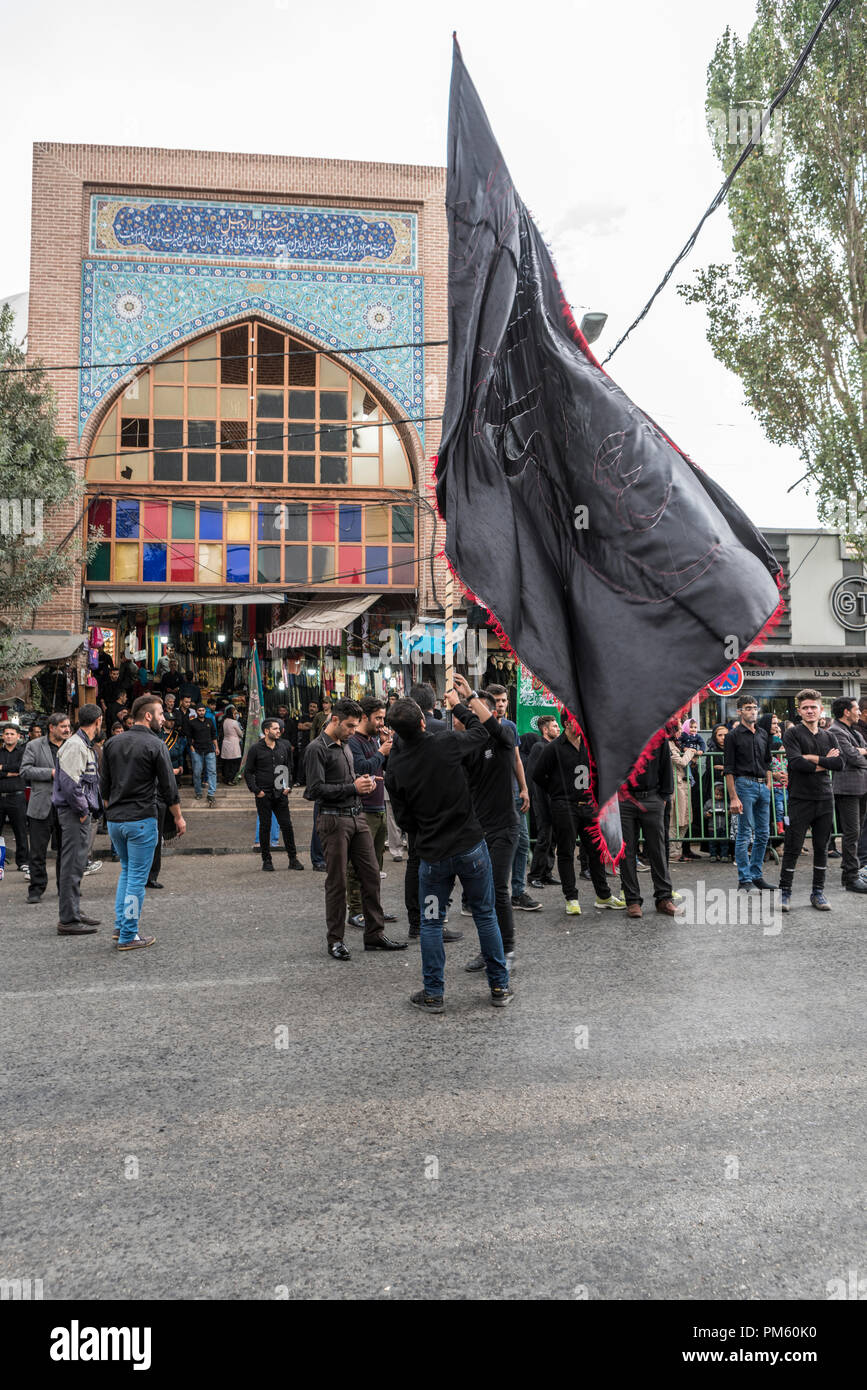 Young men waving Ashura flags in Ardabil, Iran Stock Photo - Alamy