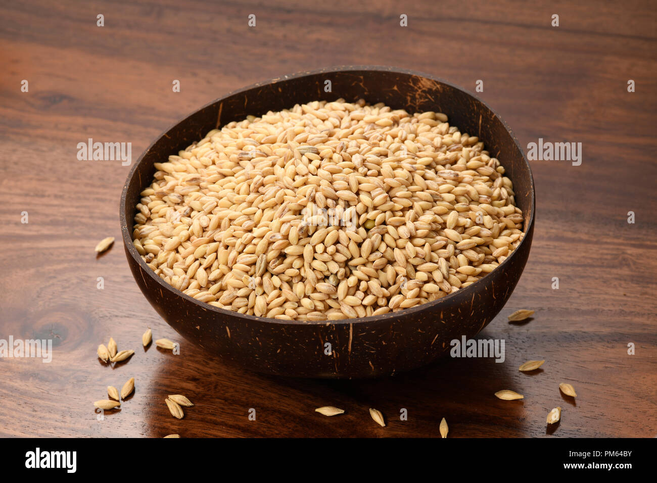 Close up of Hulless Barley in a Coconut Shell Bowl Stock Photo - Alamy