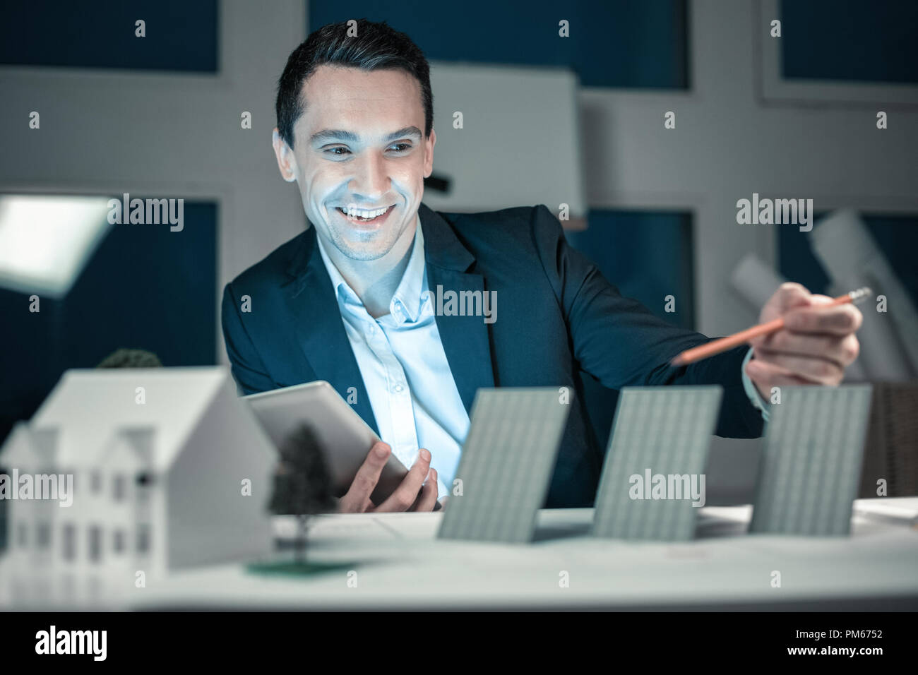 Smart engineer projecting a solar power station Stock Photo - Alamy