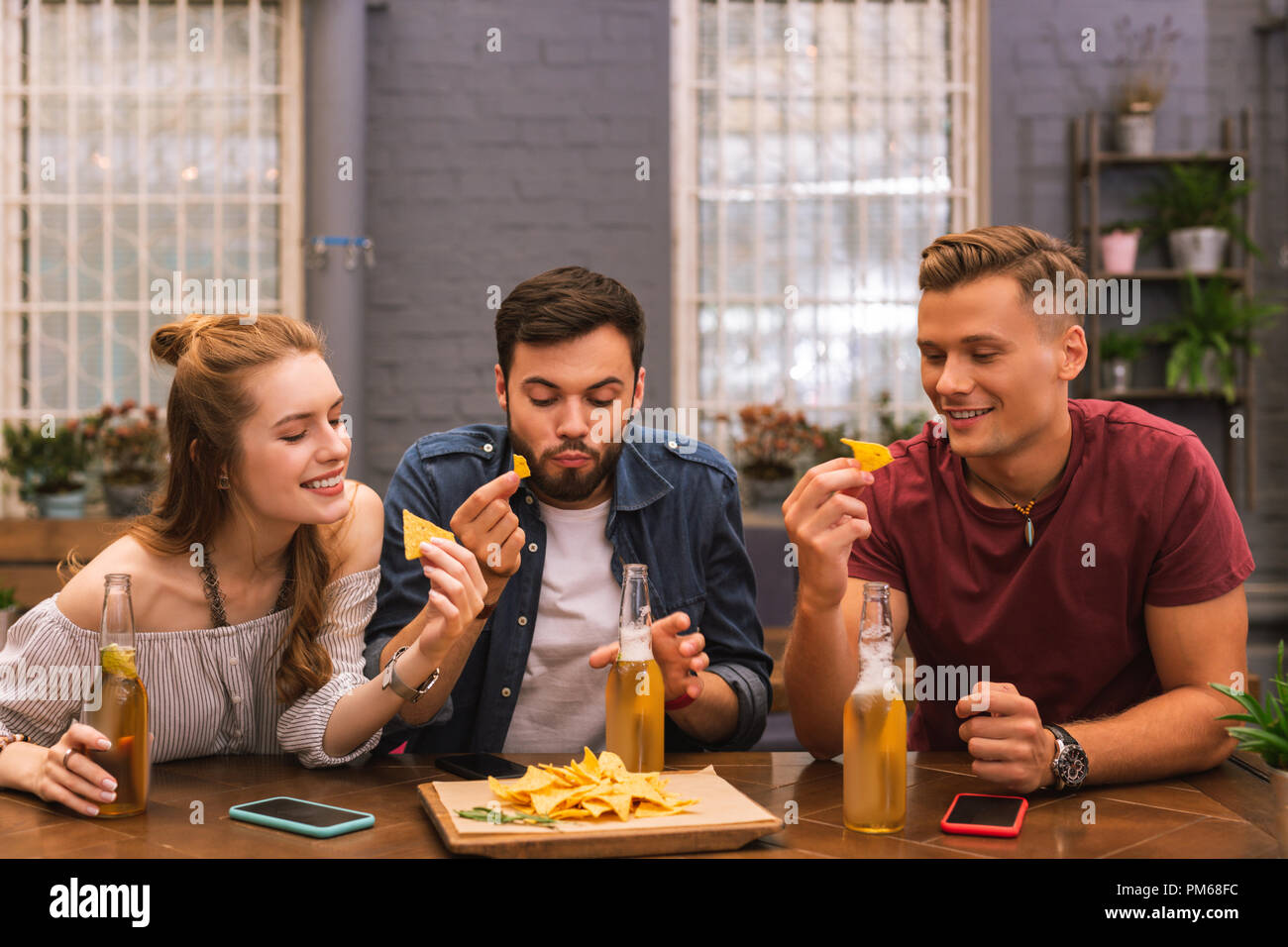Eating crisps man hi-res stock photography and images - Alamy