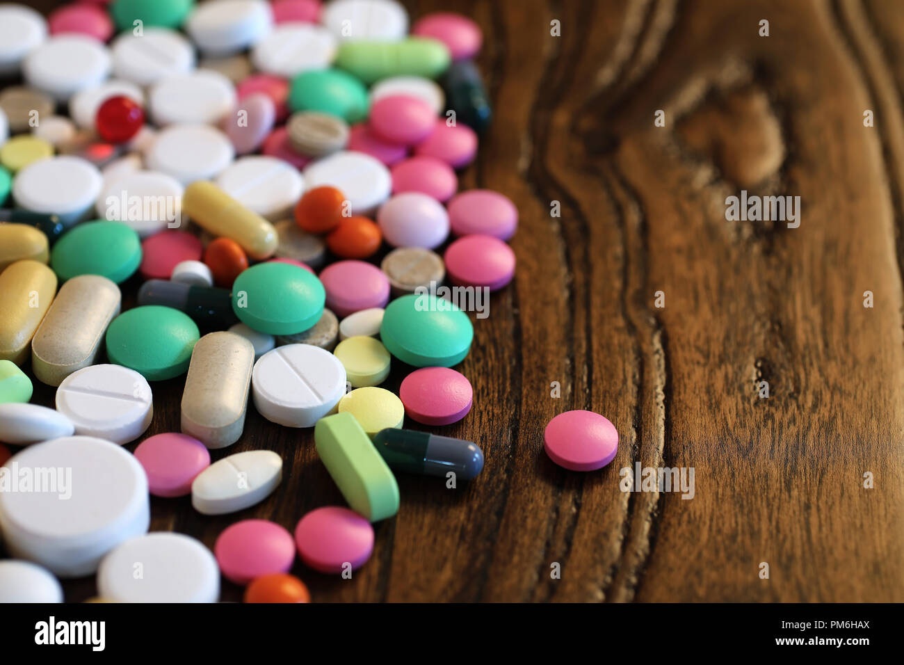 Multicolored tablets of different shapes and sizes Stock Photo - Alamy