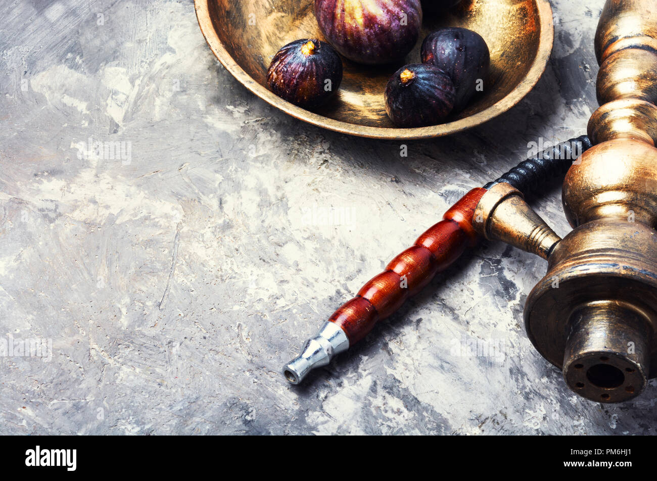 Fashionable fruit smoking hookah with a tobacco flavor of figs.Eastern ...