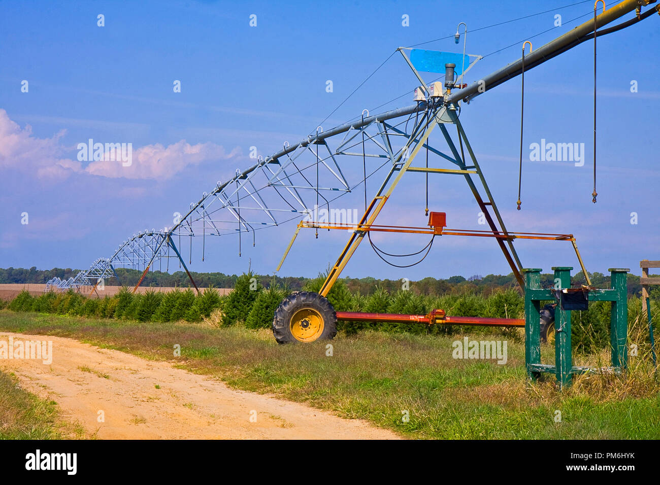 Farmer's field water sprayer with wheels Stock Photo - Alamy