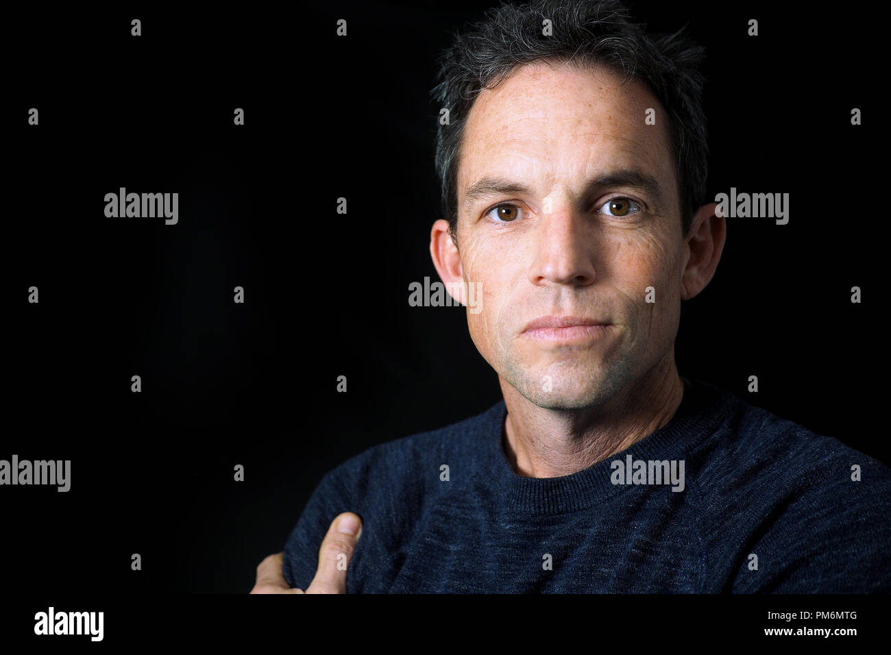 Man face black background hi-res stock photography and images - Alamy