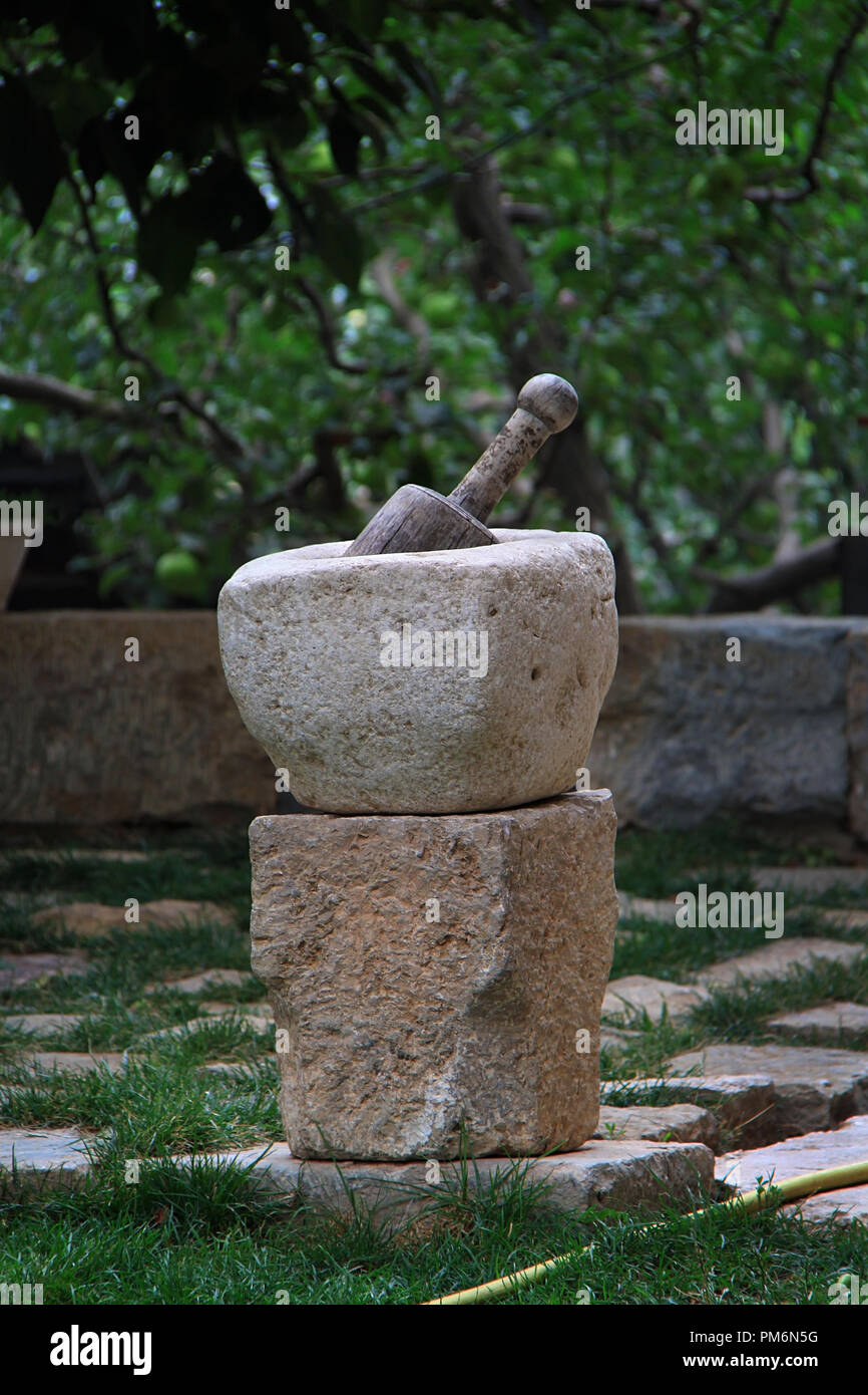 A traditional stone container used in the past to make kebbeh in ...