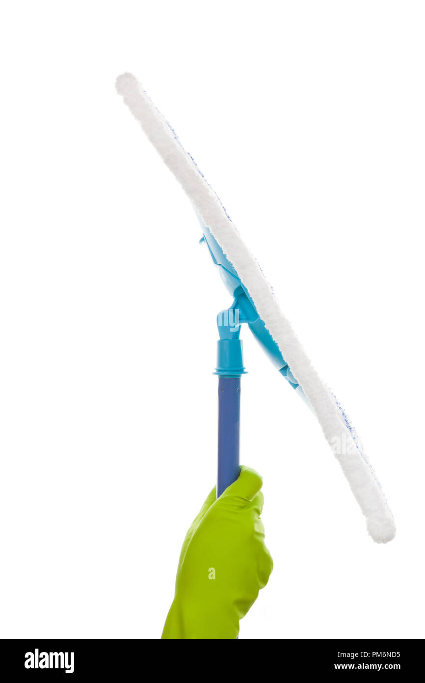 Hand with cleaning gloves holding microfiber mop isolated on white ...