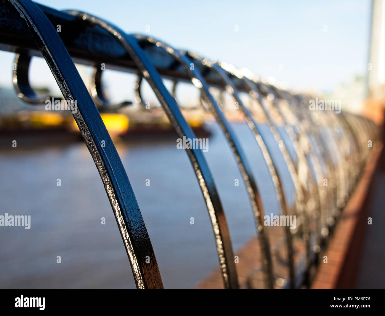 Perspective and abstract view of iron cast hand railing at a sidewalk ...