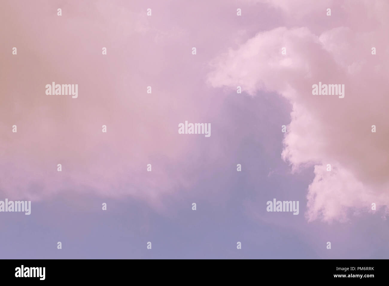 Nature background. Fluffy soft clouds in sky toned Stock Photo - Alamy