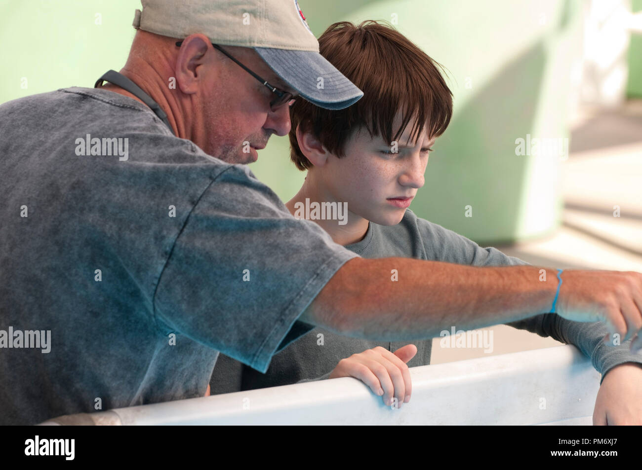 Director CHARLES MARTIN SMITH with NATHAN GAMBLE on the set of Alcon ...