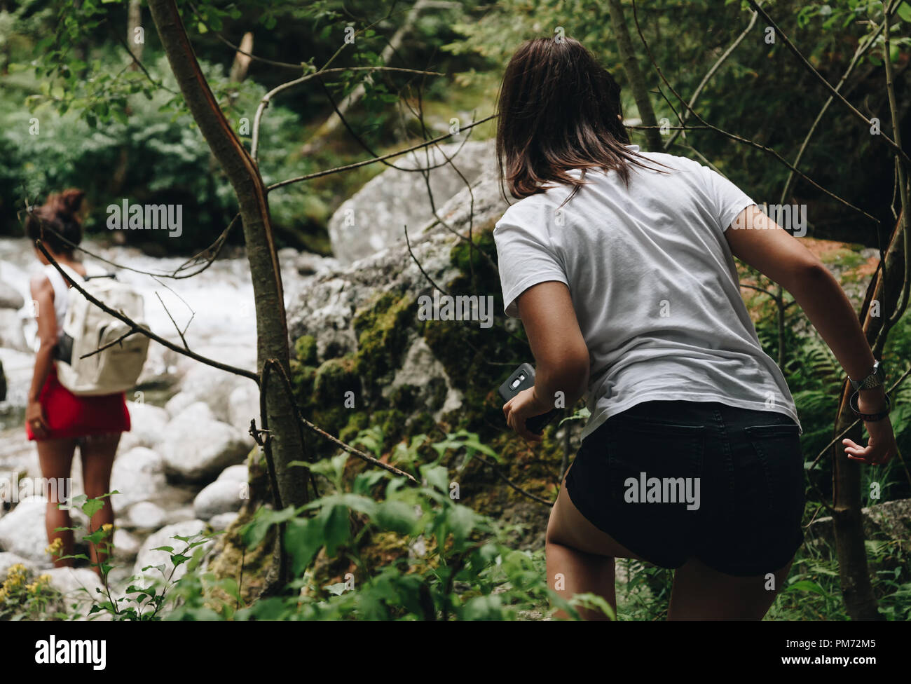 girls trekking in mountain - lost in the wild Stock Photo - Alamy