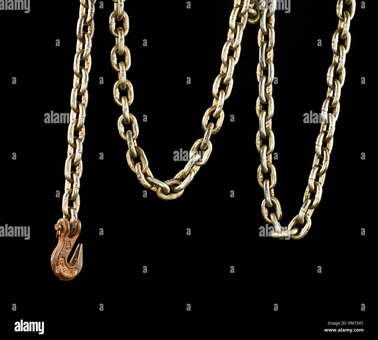 Heavy Duty Steel Chains isolated on black background with large hook ...