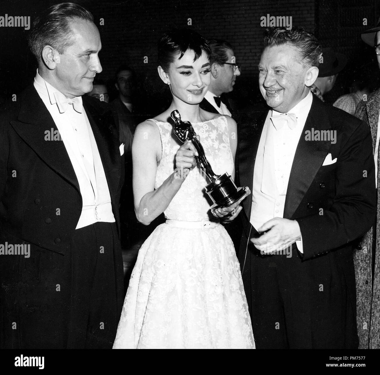Audrey Hepburn, Frederic March (left) and Jean Hersholtz (right) at the ...