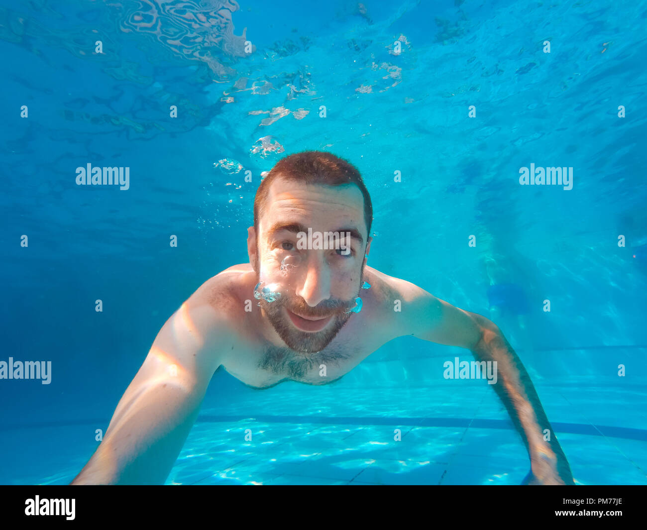 Person Diving Underwater