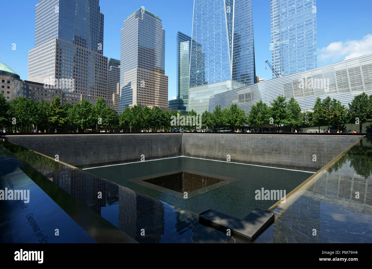 North reflecting pool of National September 11 Memorial with World ...