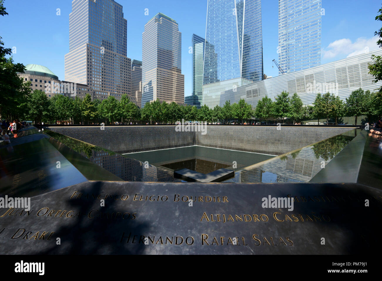 North reflecting pool of National September 11 Memorial with World ...
