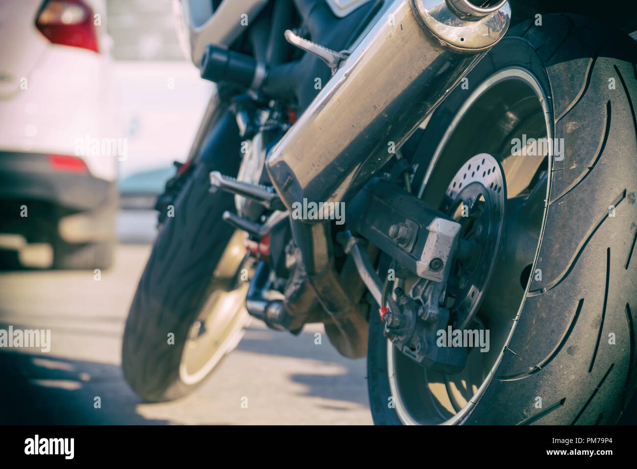 Rear view of the motorcycle. Rear wheel, exhaust pipe Stock Photo - Alamy