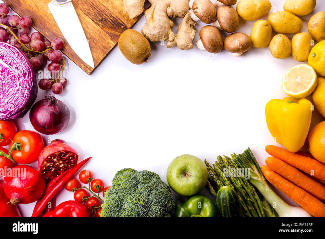 Top view of frame full of colorful fresh vegetables on a white ...