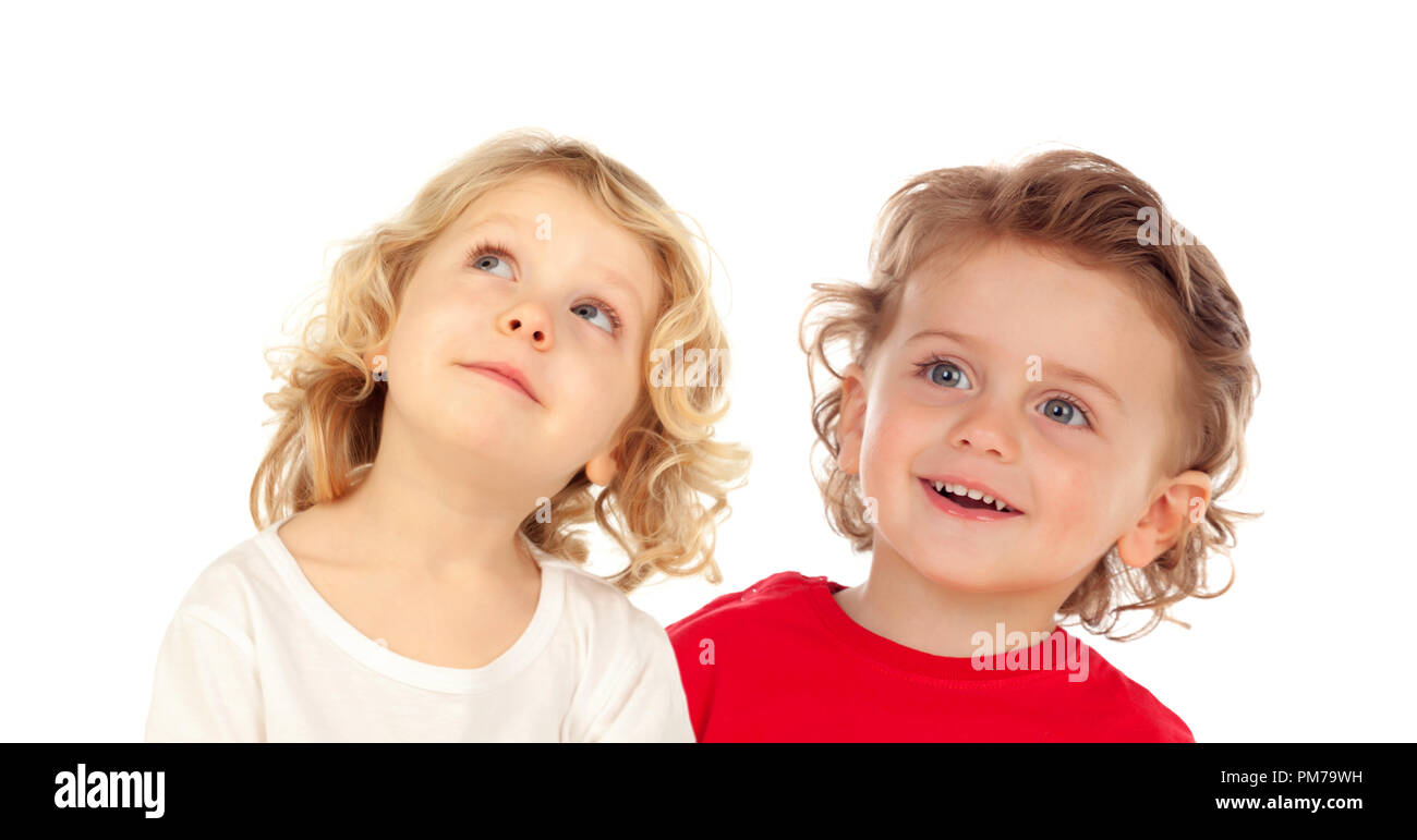 Two happy children looking up isolated on a white backround Stock Photo ...