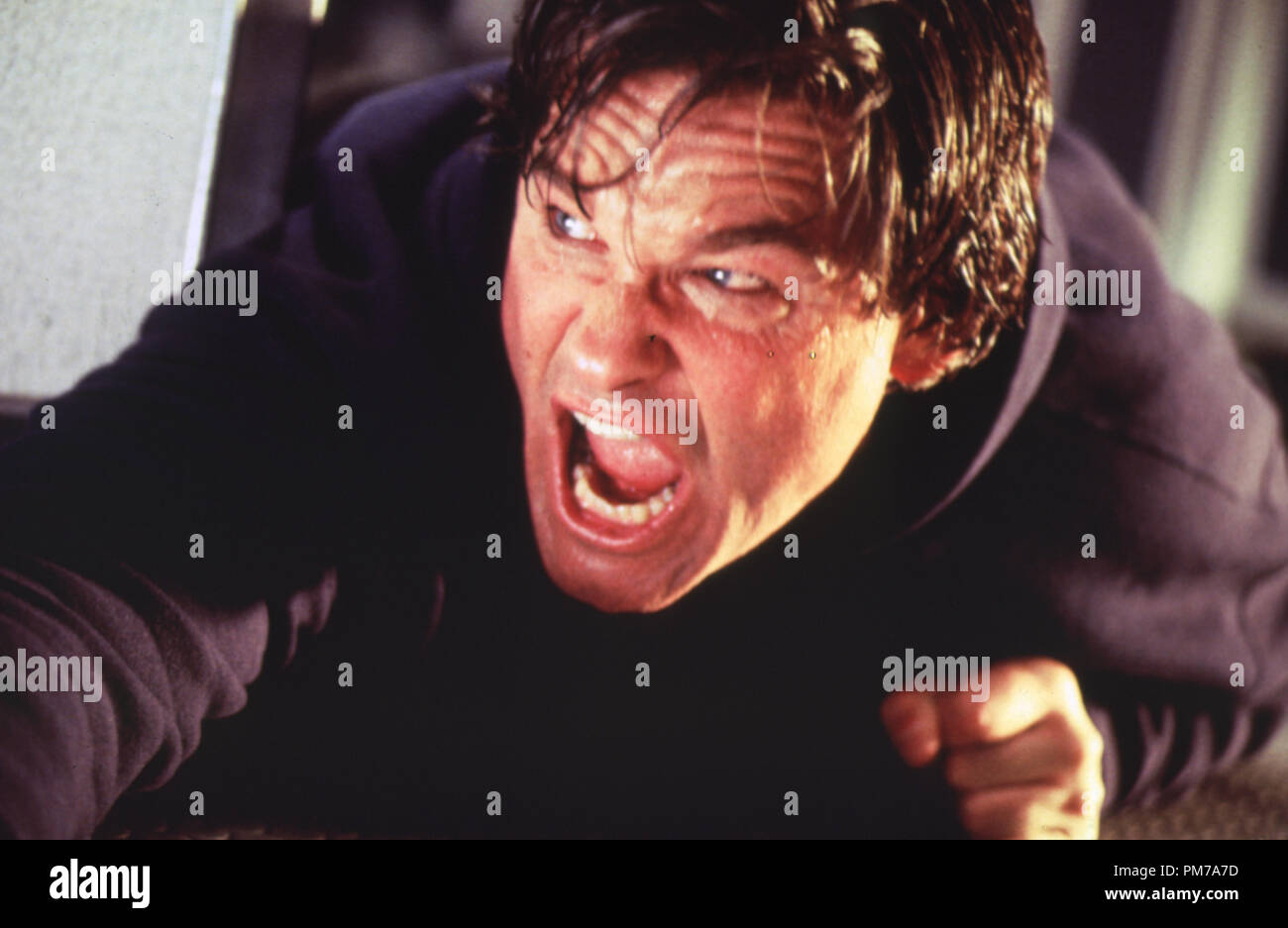 Kurt russell © 1996 warner brothers photo credit hi-res stock ...