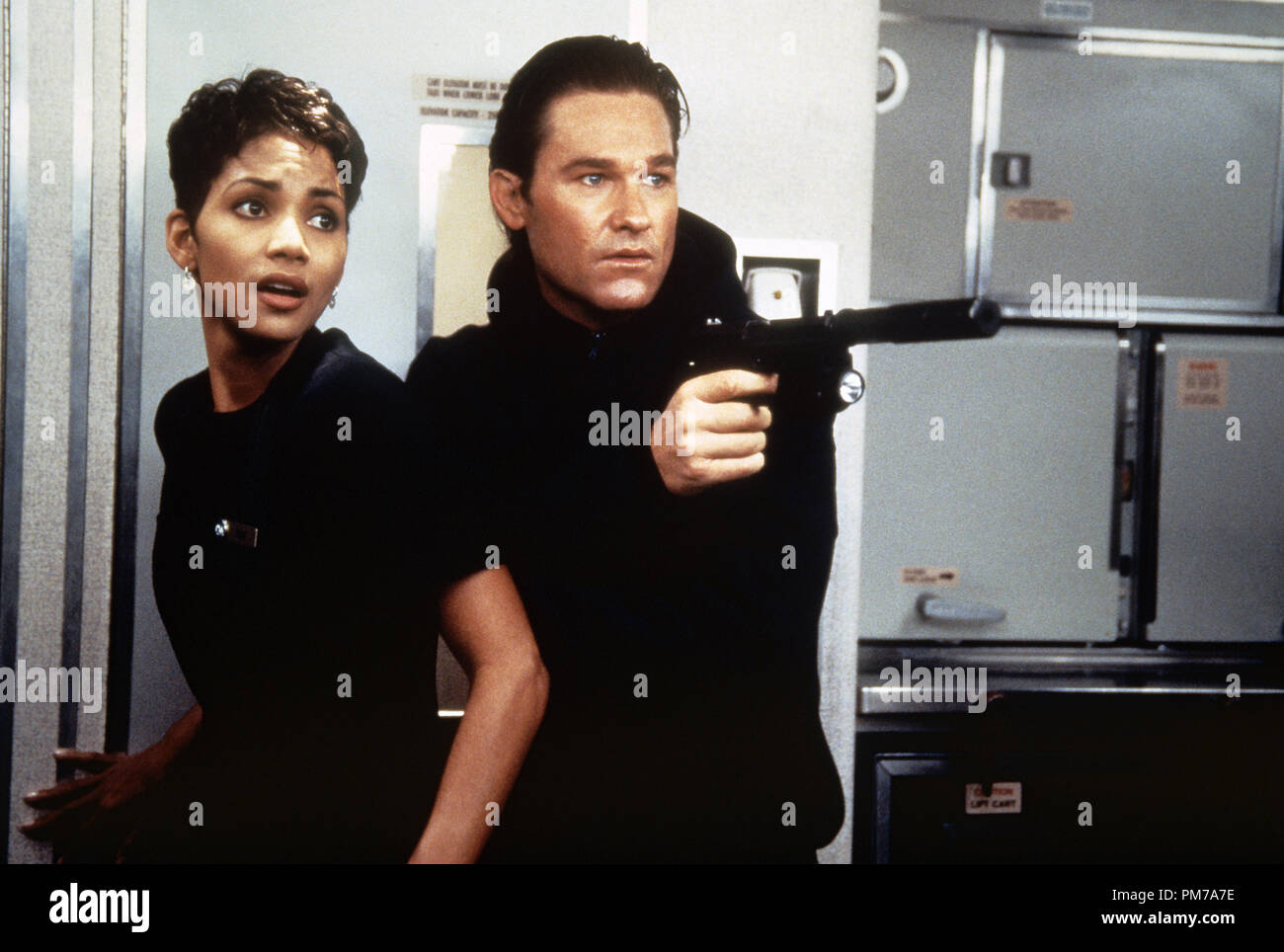 Kurt russell © 1996 warner brothers photo credit hi-res stock ...