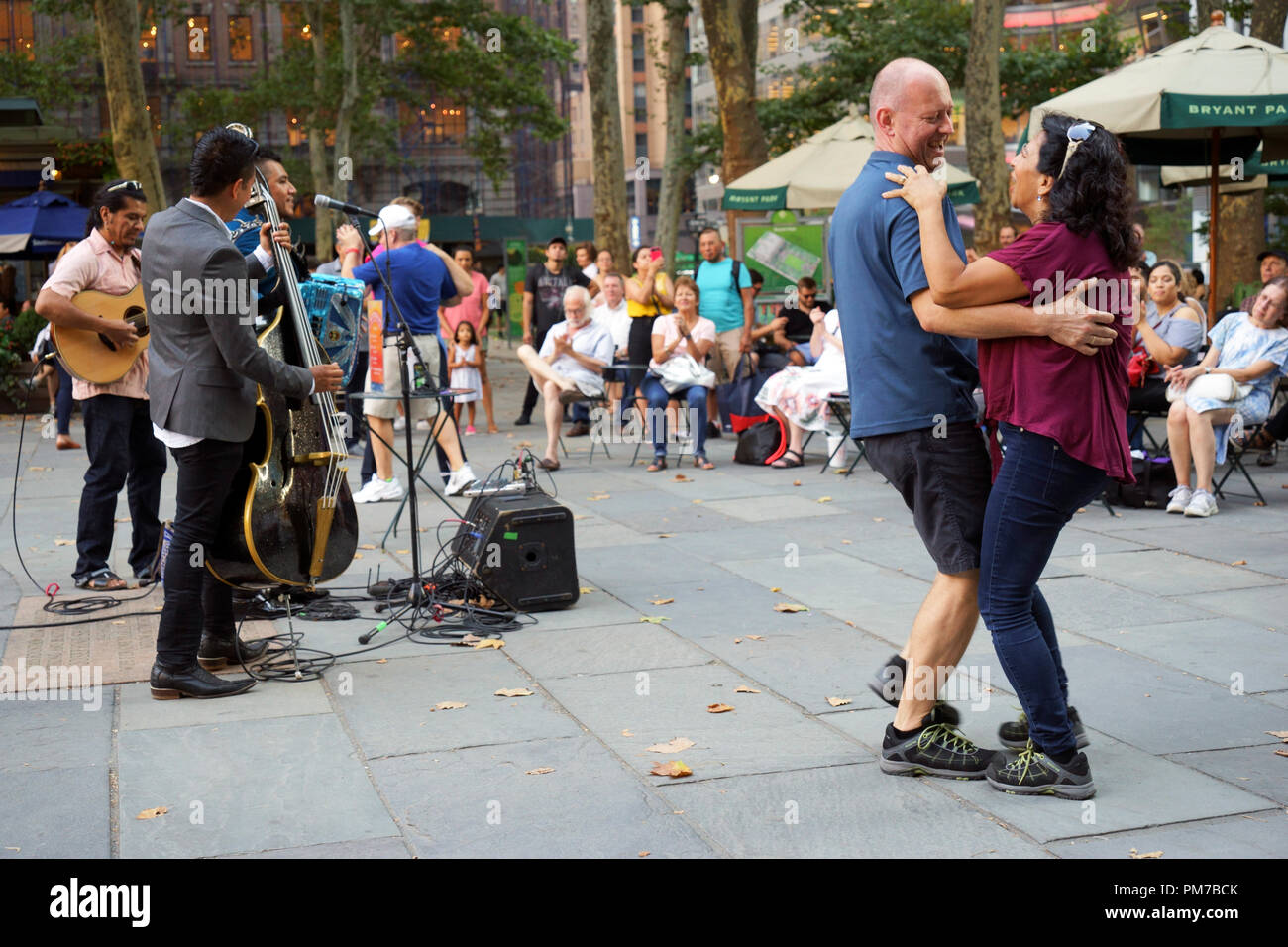 People dancing with a band playing music at Accordion Festival in ...