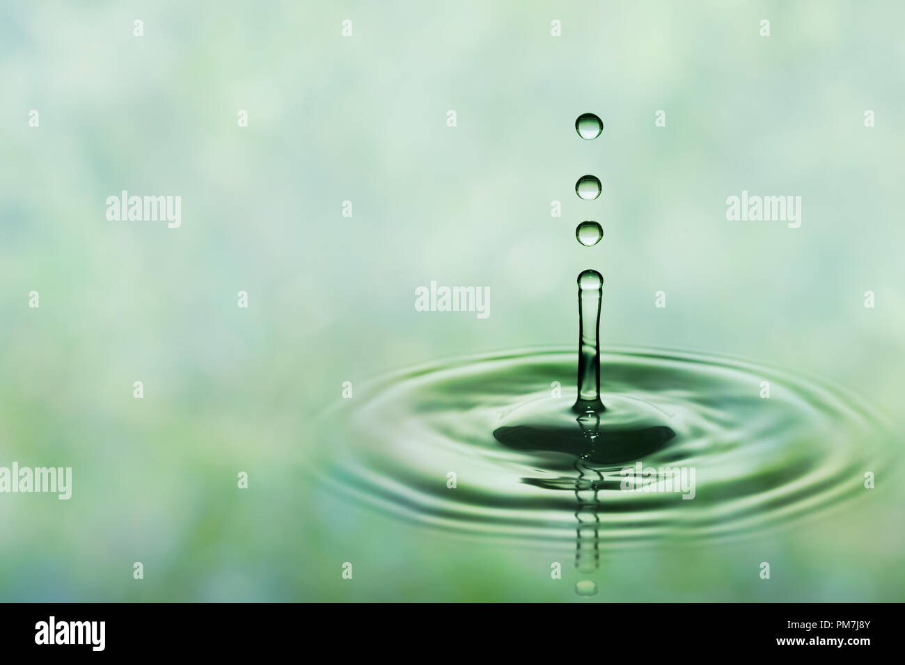 Green water drop waves hi-res stock photography and images - Alamy