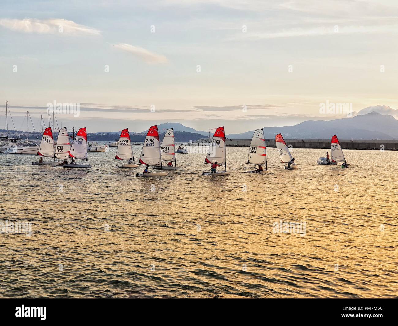 Sailing on gold Stock Photo - Alamy