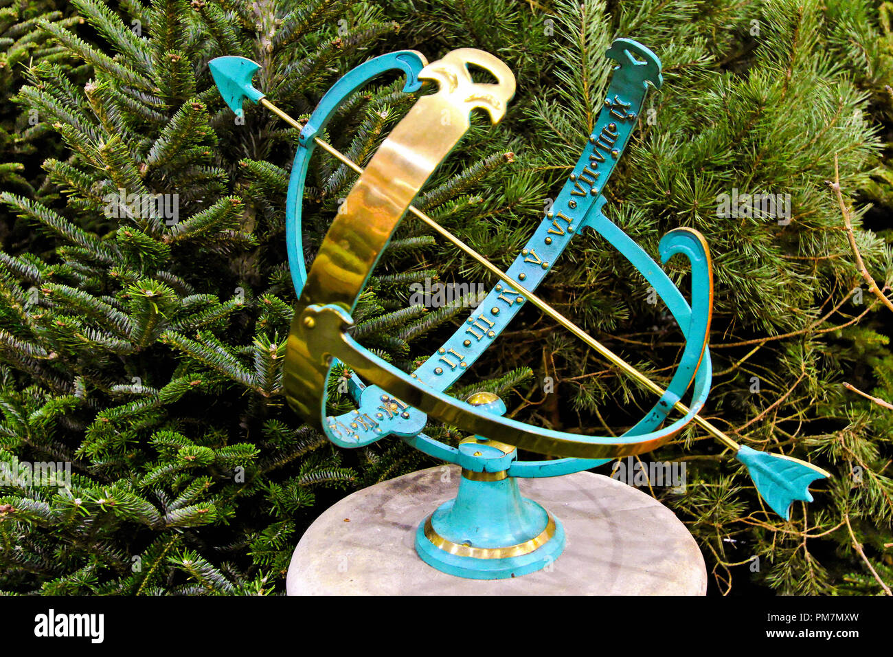 Old Metal Sun Clock in Garden Stock Photo - Alamy