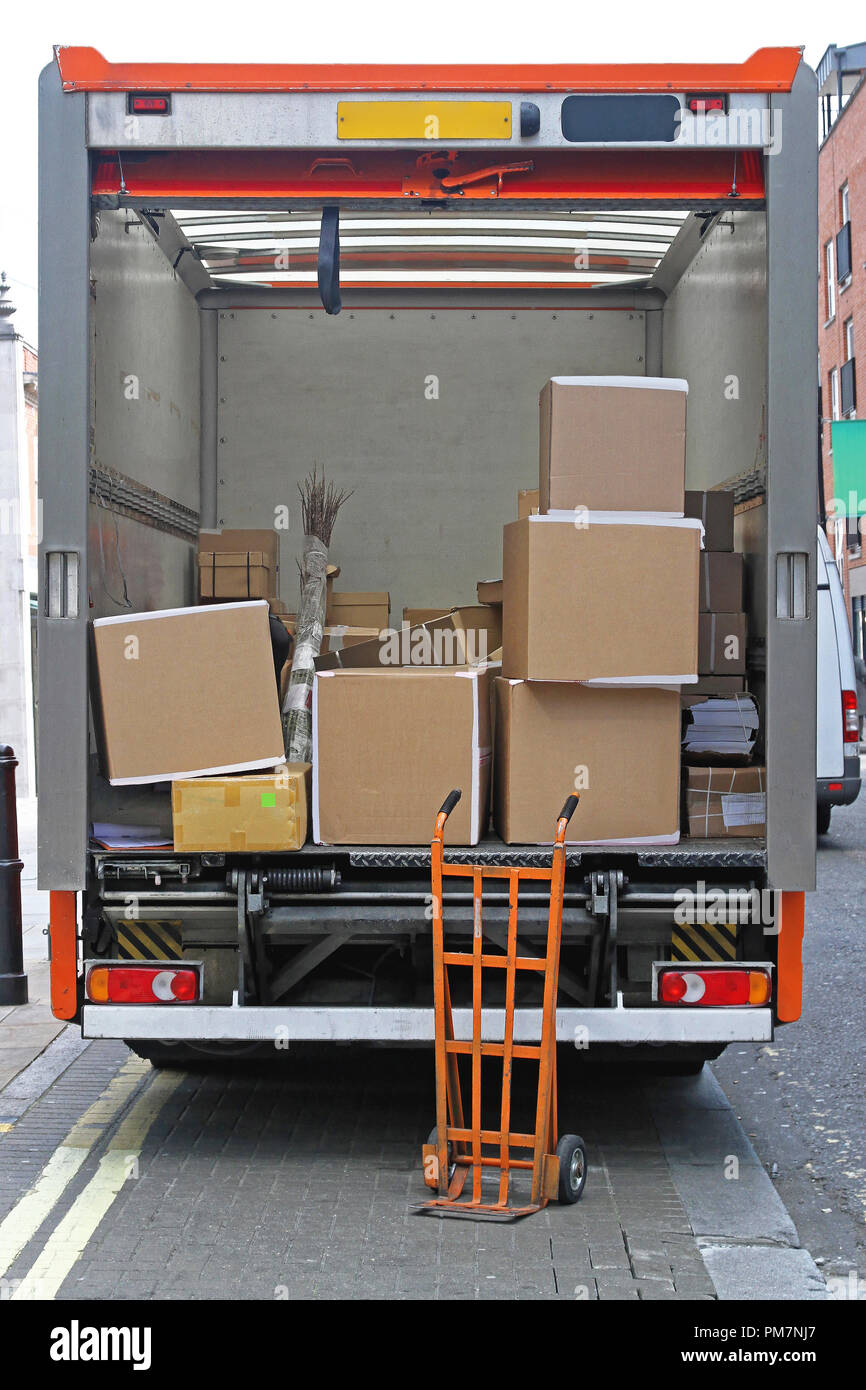 Hand Cart and Boxes Delivery Truck Cargo Stock Photo - Alamy