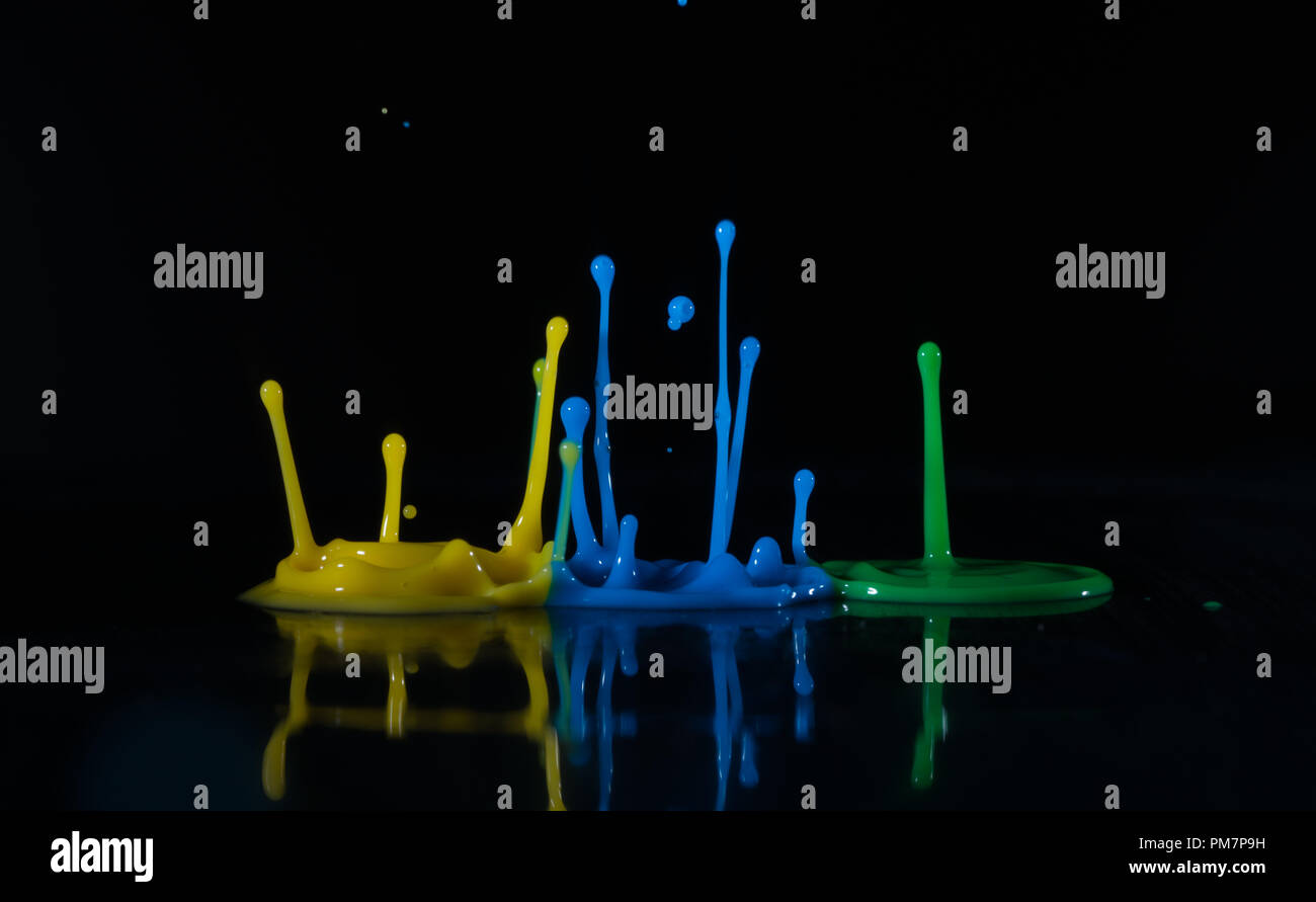 abstract color splash isolated on black background Stock Photo - Alamy