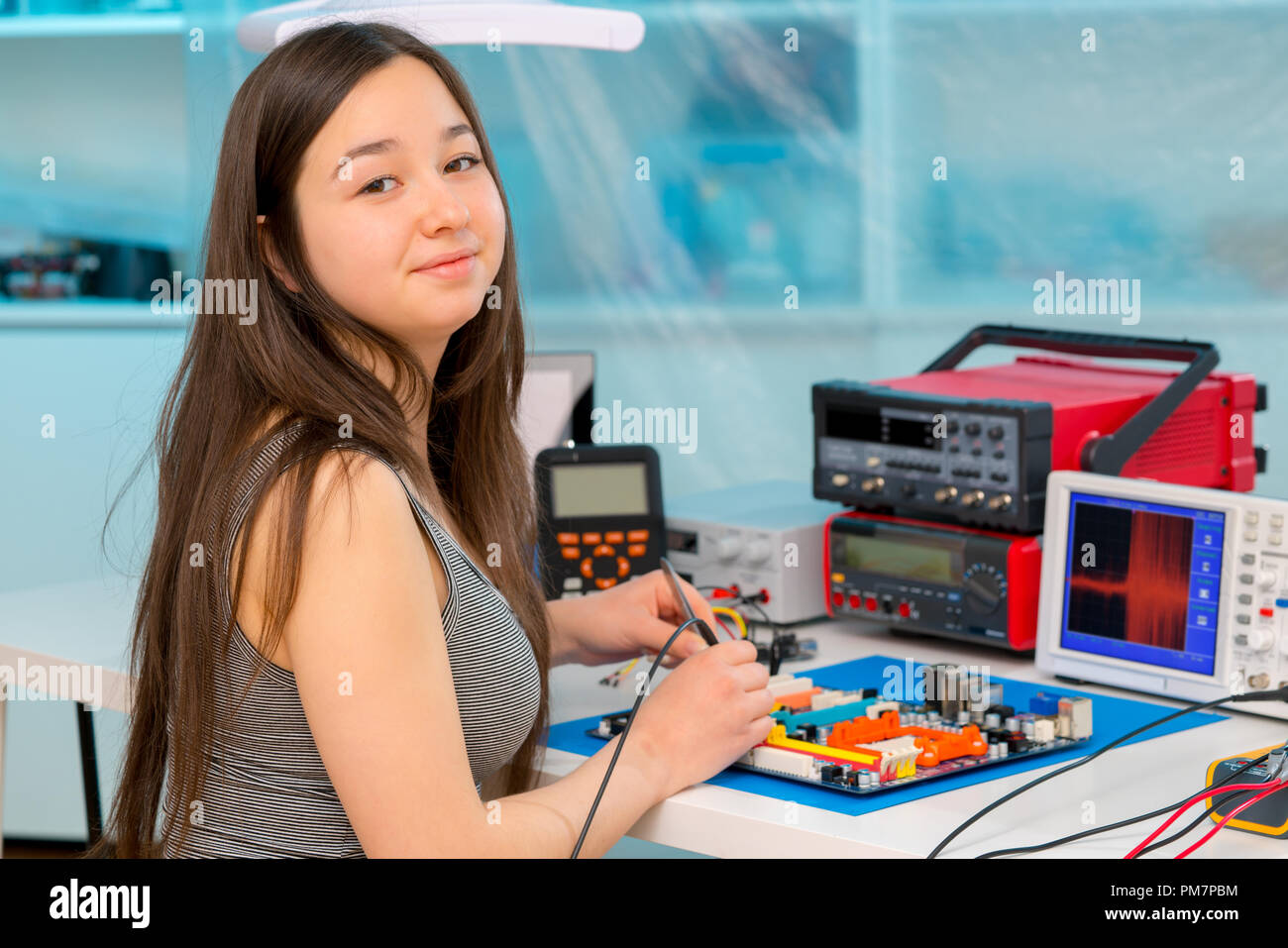 Girl in robotics laboratory Stock Photo - Alamy