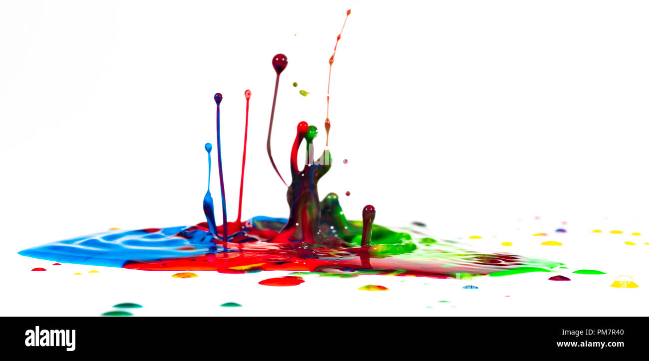splash of color ink on white background Stock Photo - Alamy